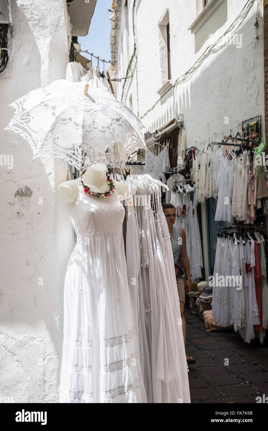 traditional Andalusian street clothing stores in Marbella, Andalucia ...