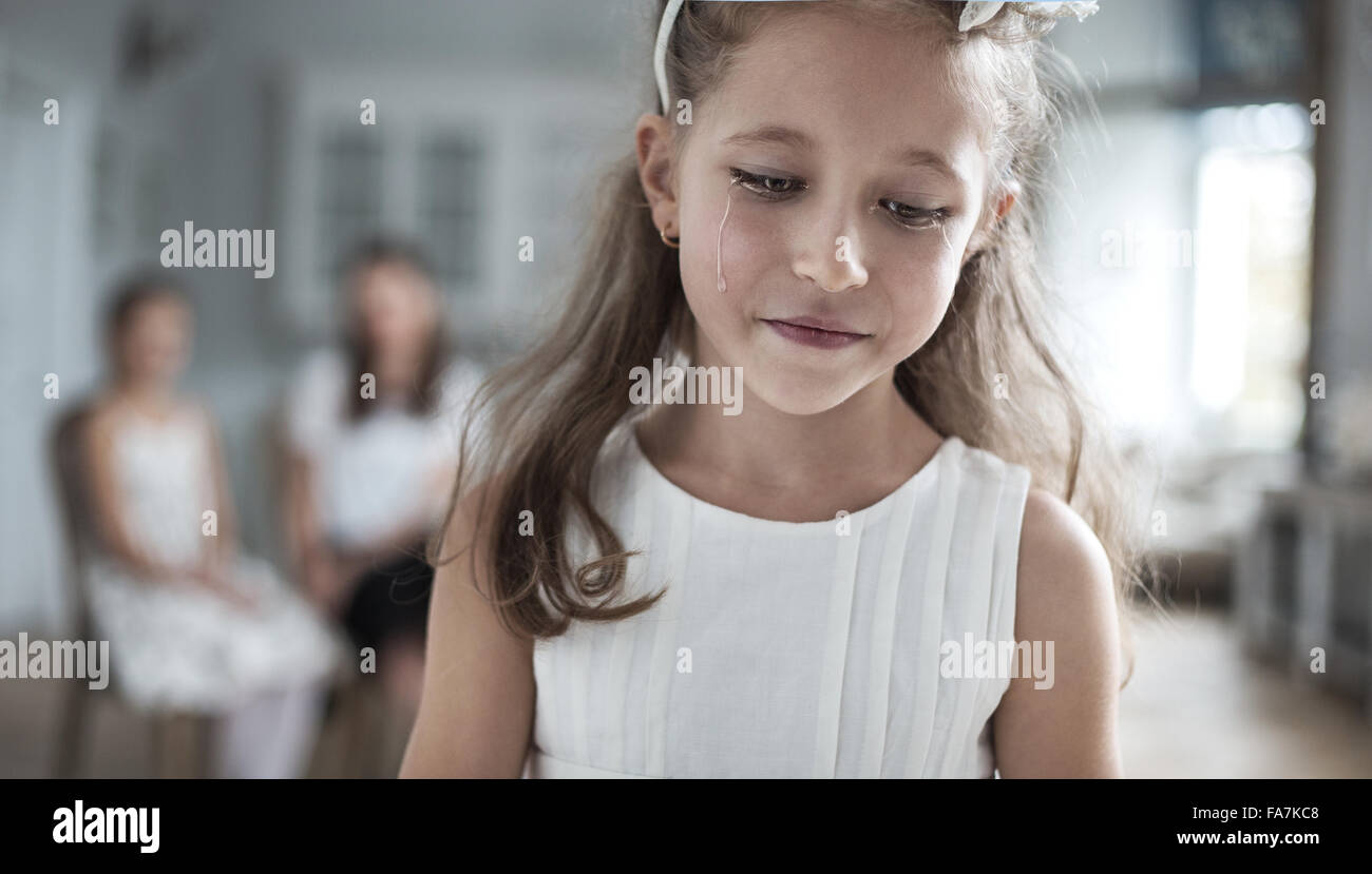 Portrait of a little miserable girl Stock Photo - Alamy