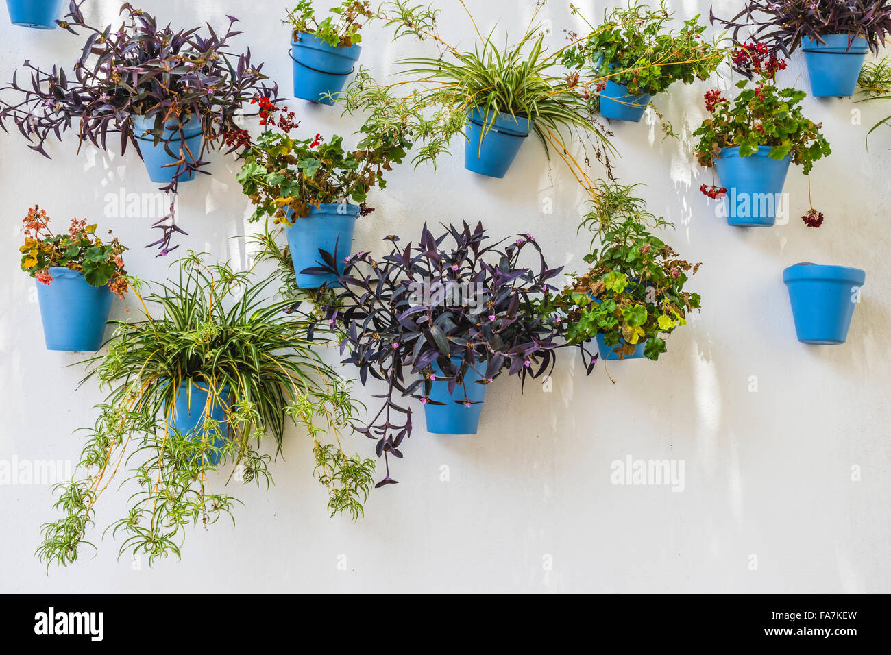 white wall with blue flower pots in Marbella, Andalucia Spain Stock ...