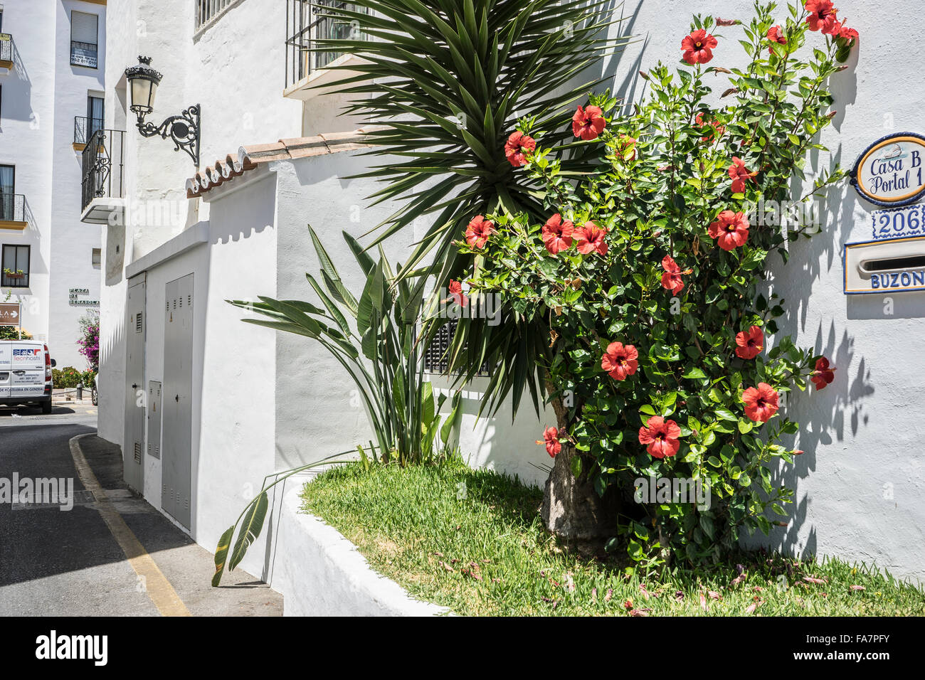 streets of Marbella in Spain with flowers and plants on the facade ...
