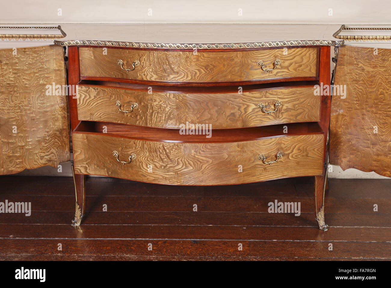 George III satinwood and marquetry serpentine commode attributed to ...