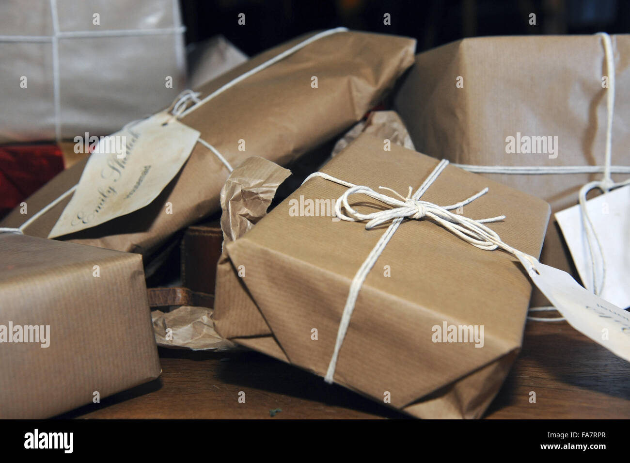 Wrapped Christmas parcels in brown paper, part of the display at ...