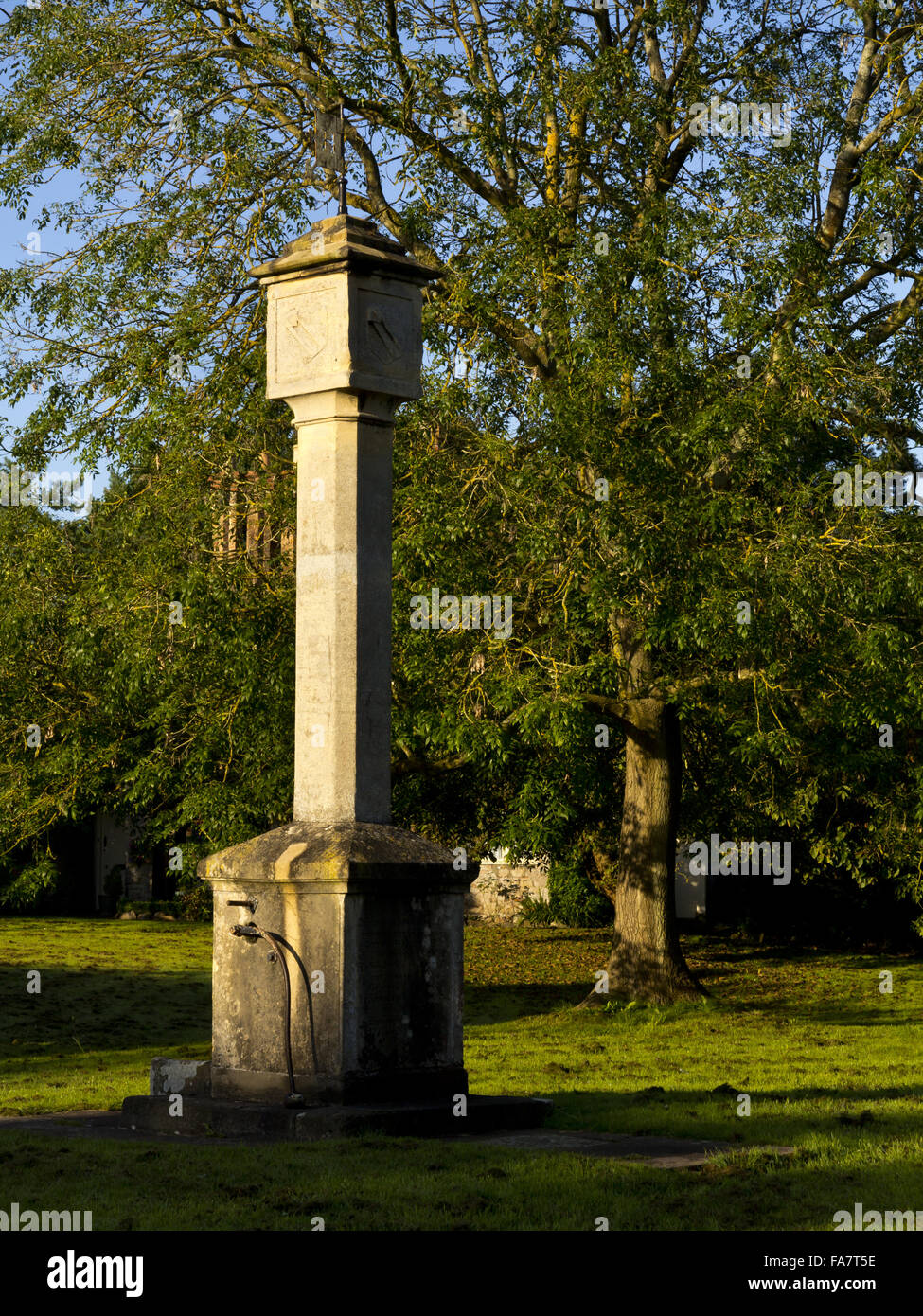 The sundial clock tower on the green at Blaise Hamlet in Bristol. The ...