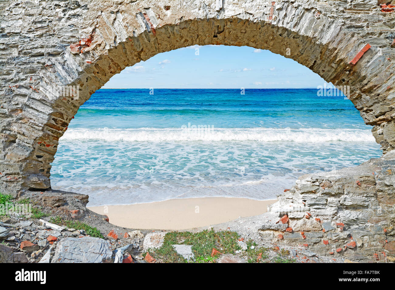 stone arch by a tropical beach Stock Photo - Alamy