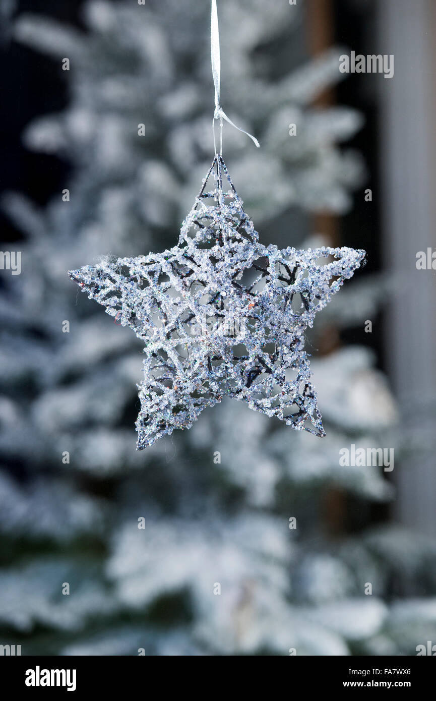 Christmas Star decoration in a window display. Cotswolds, England Stock ...
