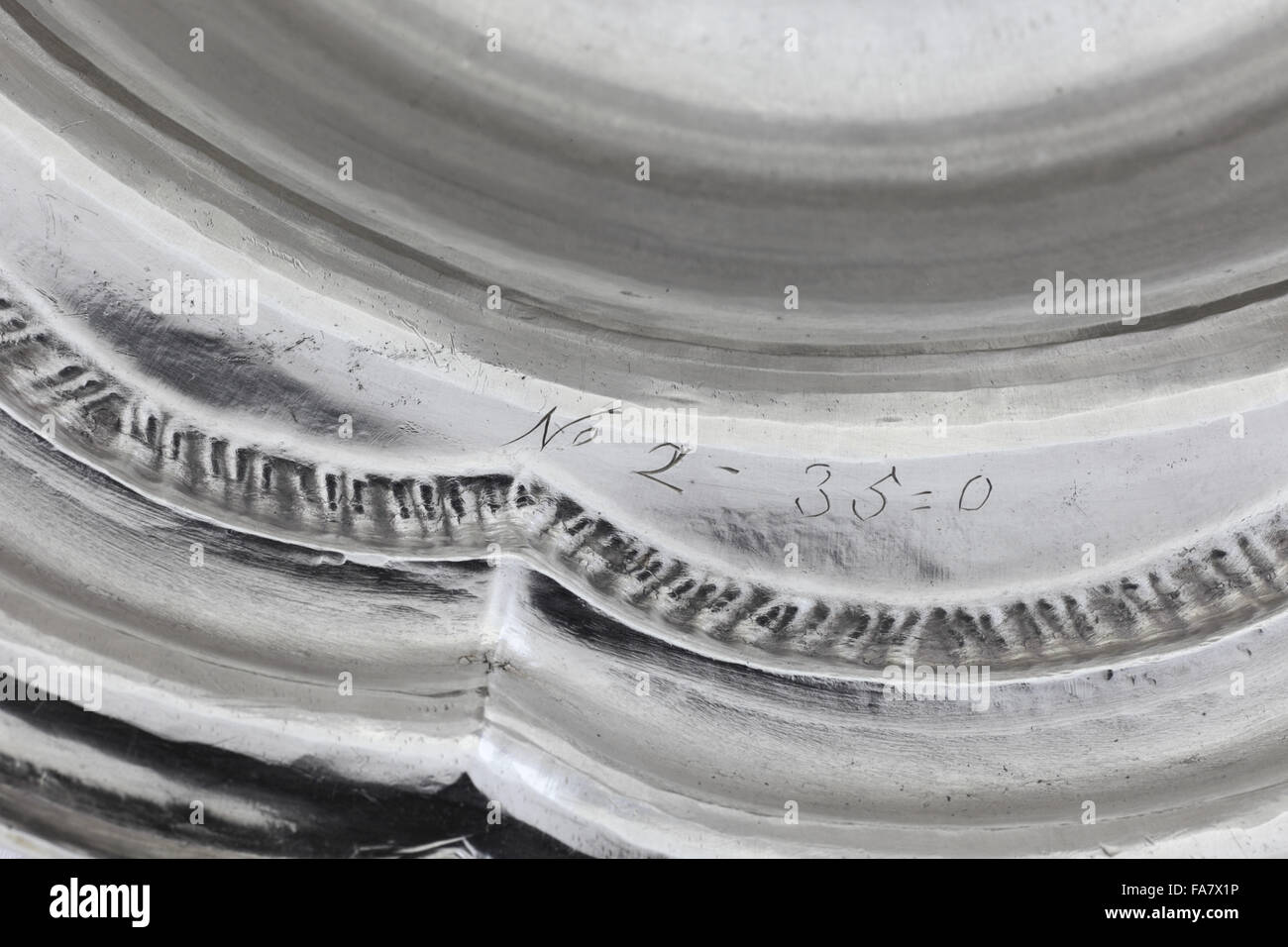 Scratch mark on a second course dish and cover, part of the silver ...