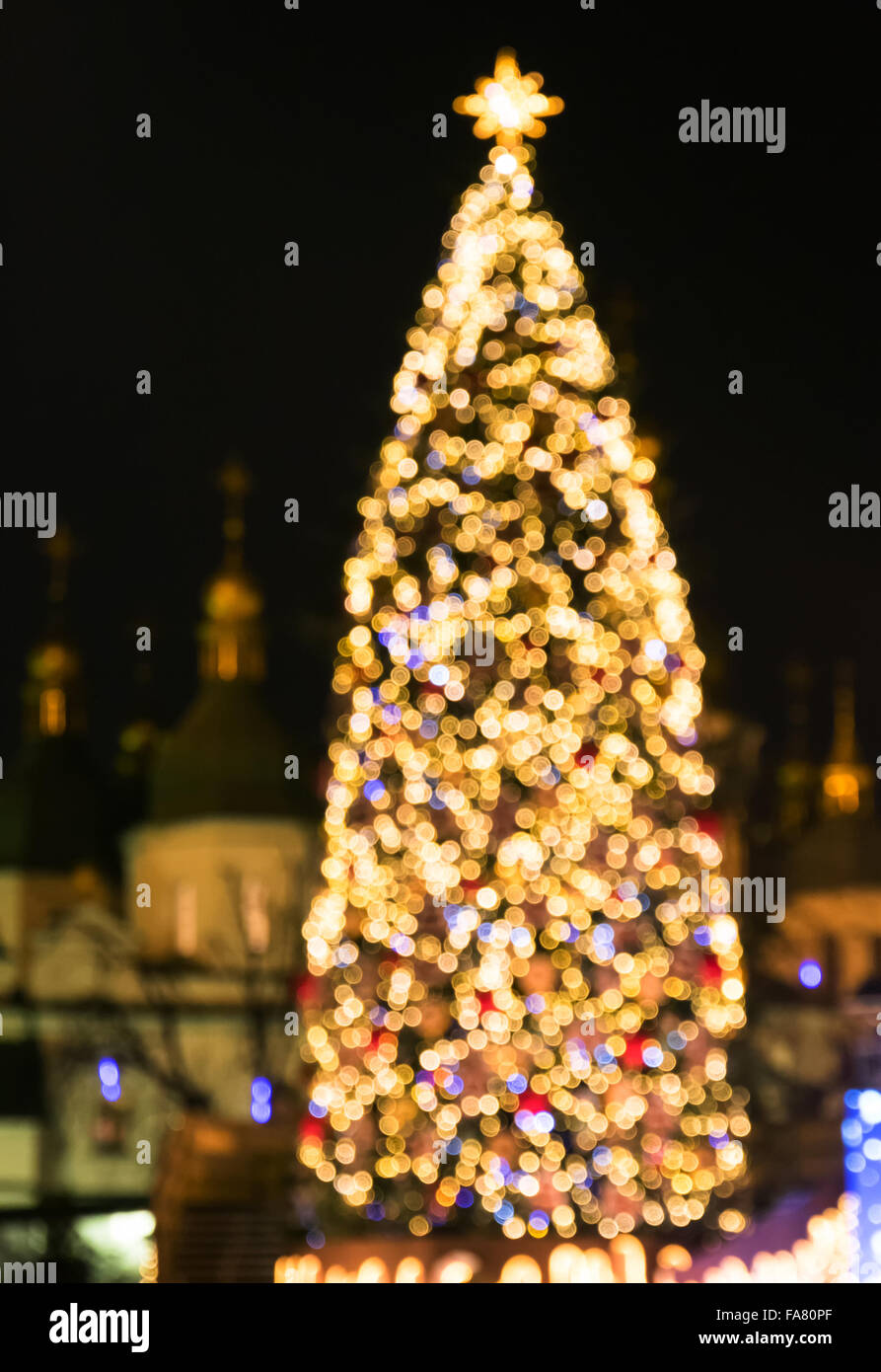 New Year's tree made from golden bokeh lights Stock Photo - Alamy