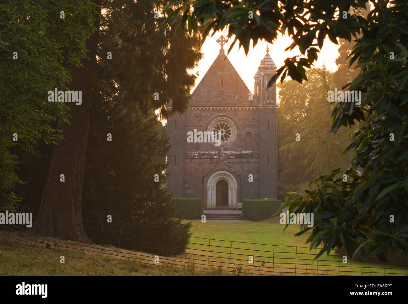 The chapel at Killerton, Devon shown in July morning light. The chapel ...