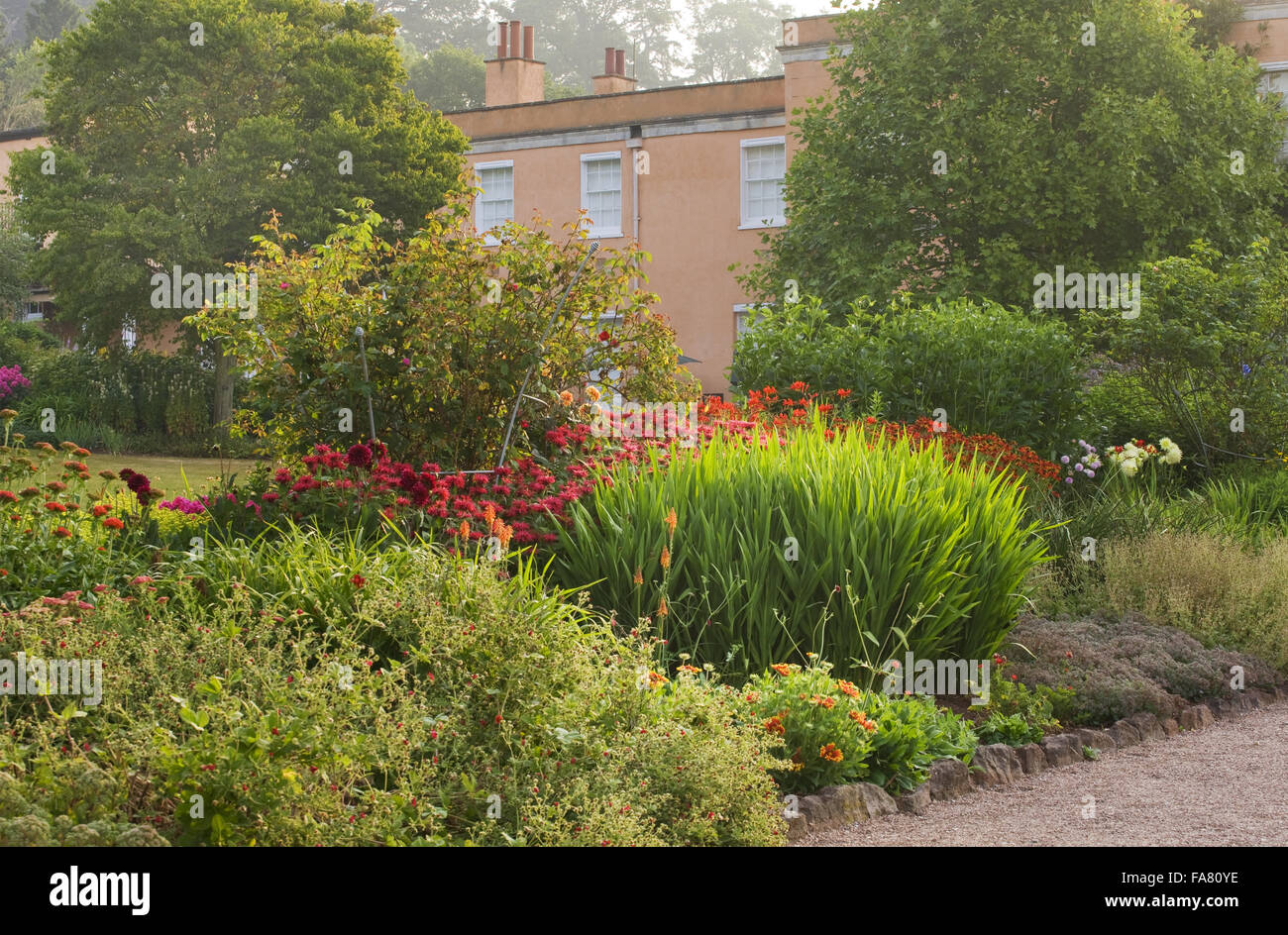 Herbaceous garden at west front of the house at Killerton, Devon ...