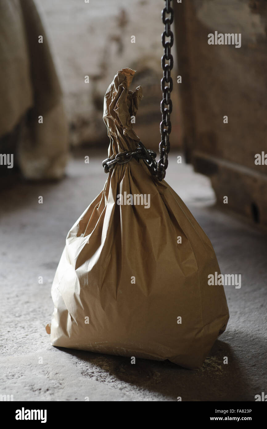Bag of grain with a metal chain attached, Clyston Mill, Killerton ...