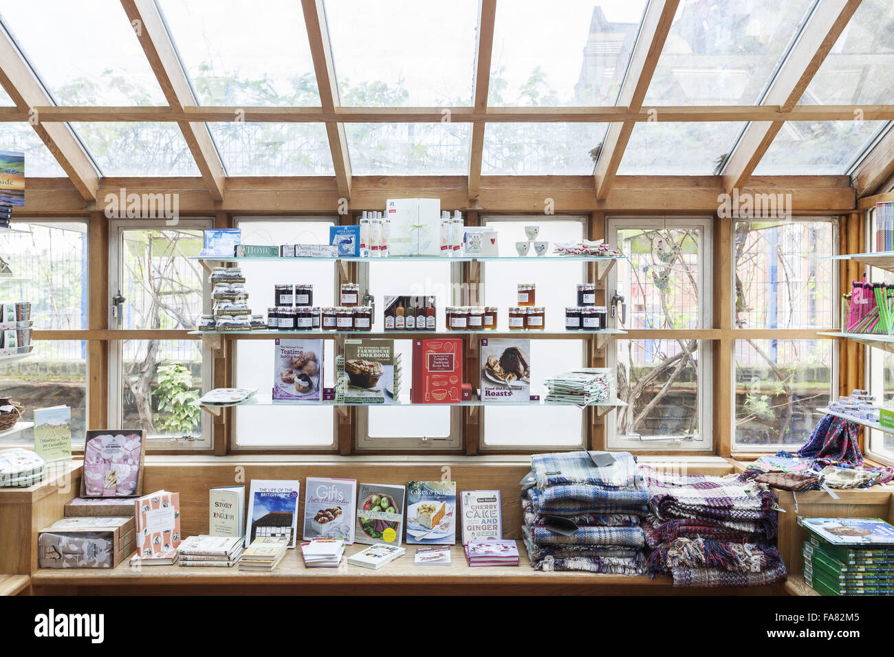 Books, preserves,rugs and other products on display in the shop, Sutton ...