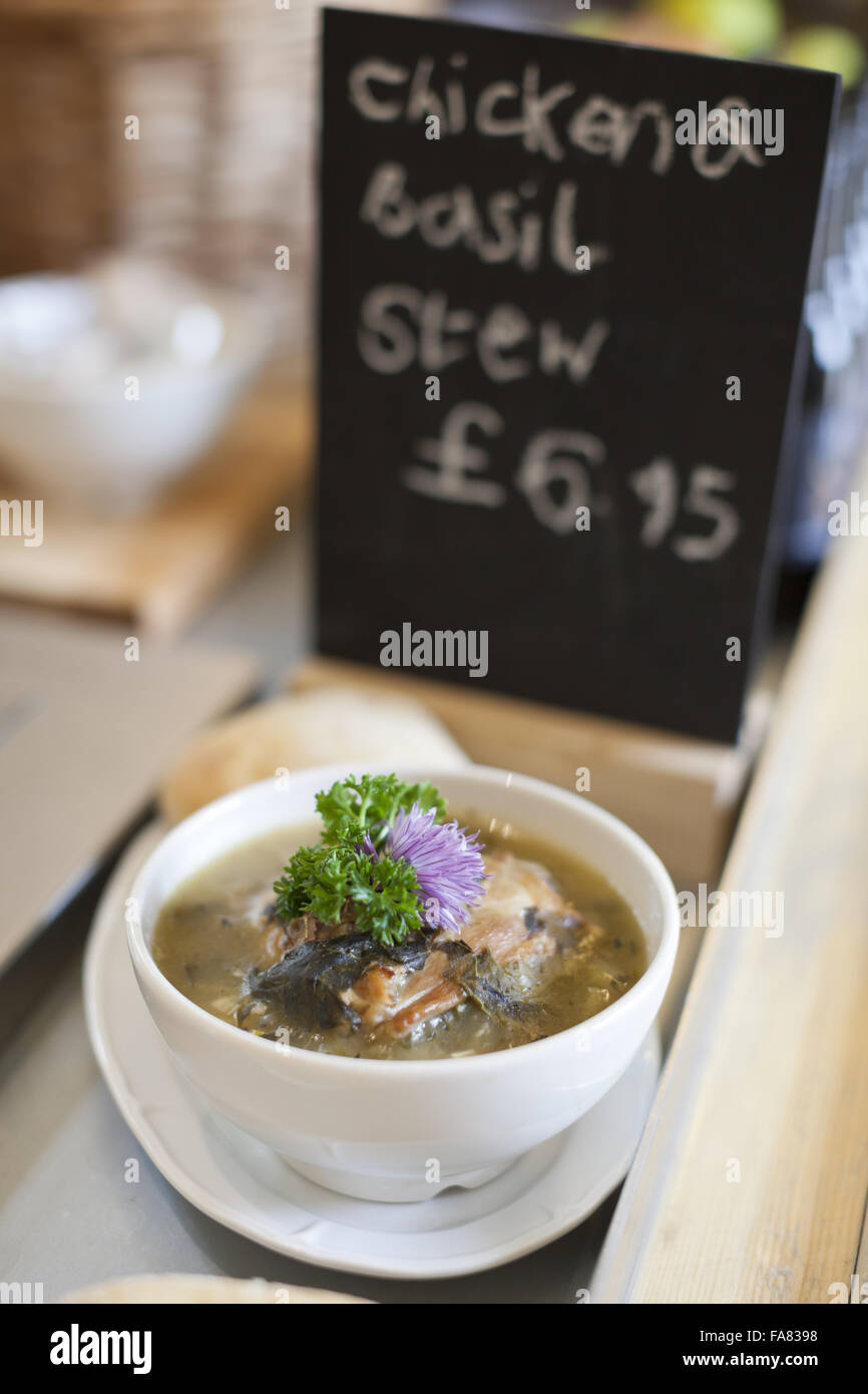 Bowl of chicken and basil stew on sale in the Orangery Cafe at Ham ...