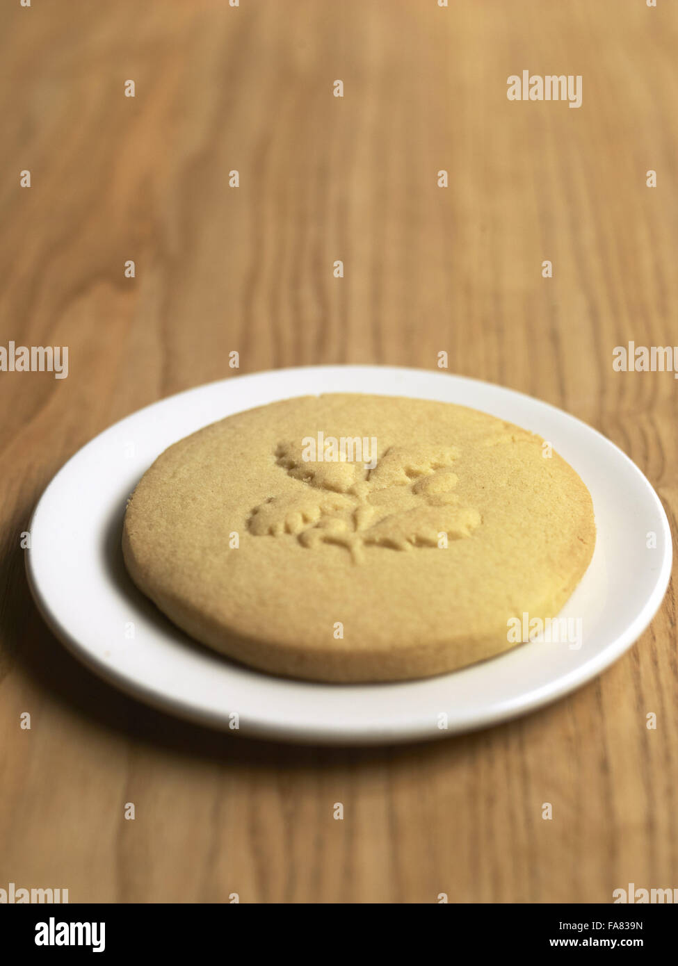 Shortbread biscuit featuring the National Trust's oak leaf logo Stock ...