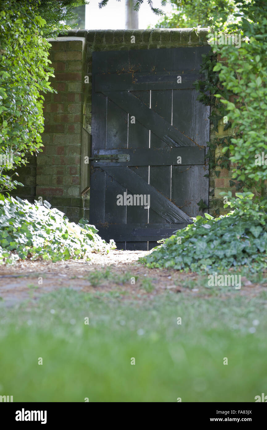 Side gate in the garden at Max Gate, Dorset. The writer Thomas Hardy ...