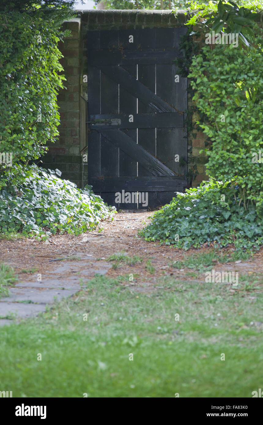 Side gate in the garden at Max Gate, Dorset. The writer Thomas Hardy ...