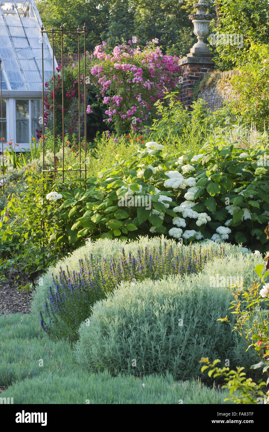 The Orangery seen from the Graham Stuart Thomas Borders at Peckover ...