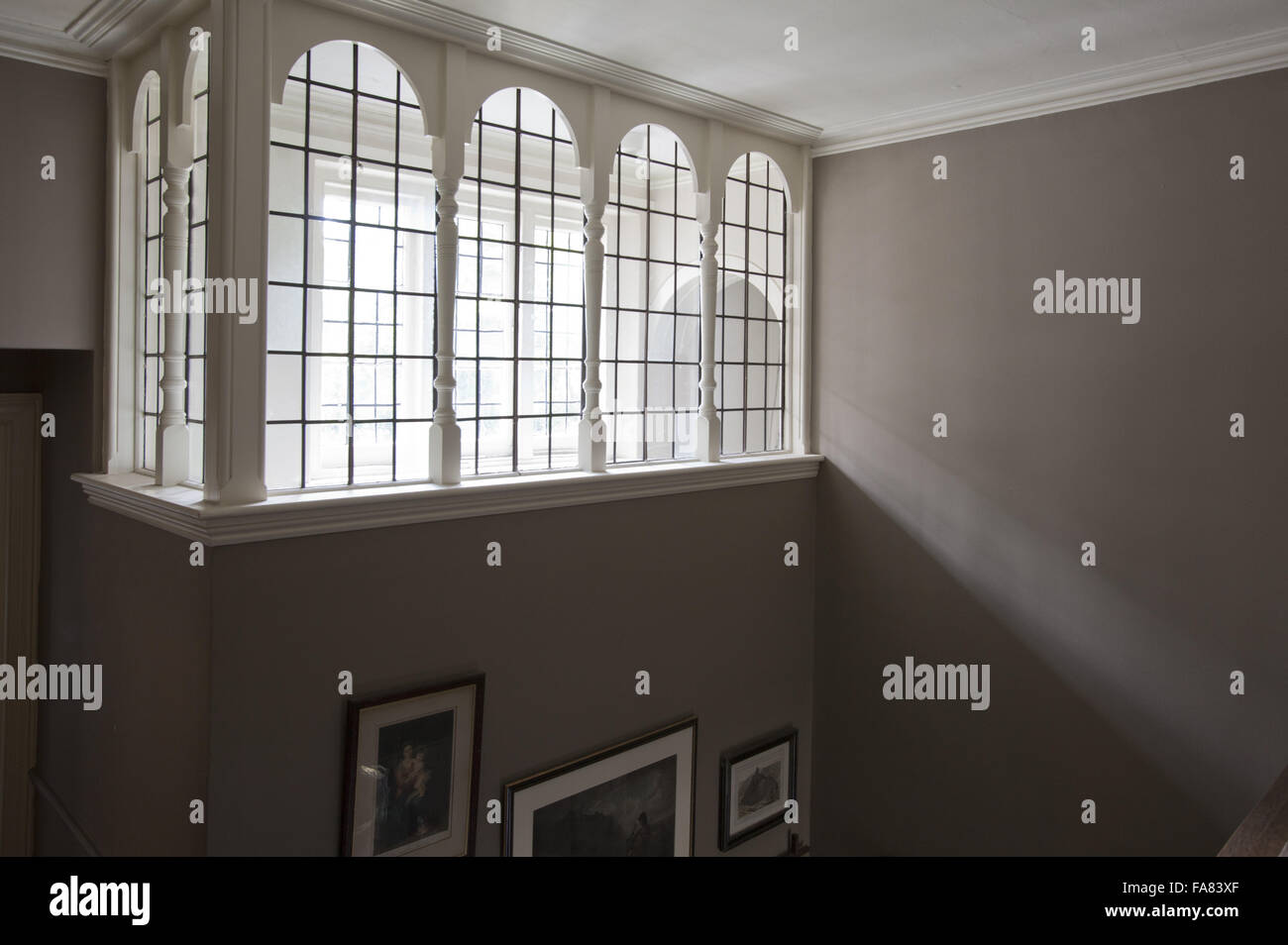 Internal windows above the staircase at Max Gate, Dorset. The writer ...