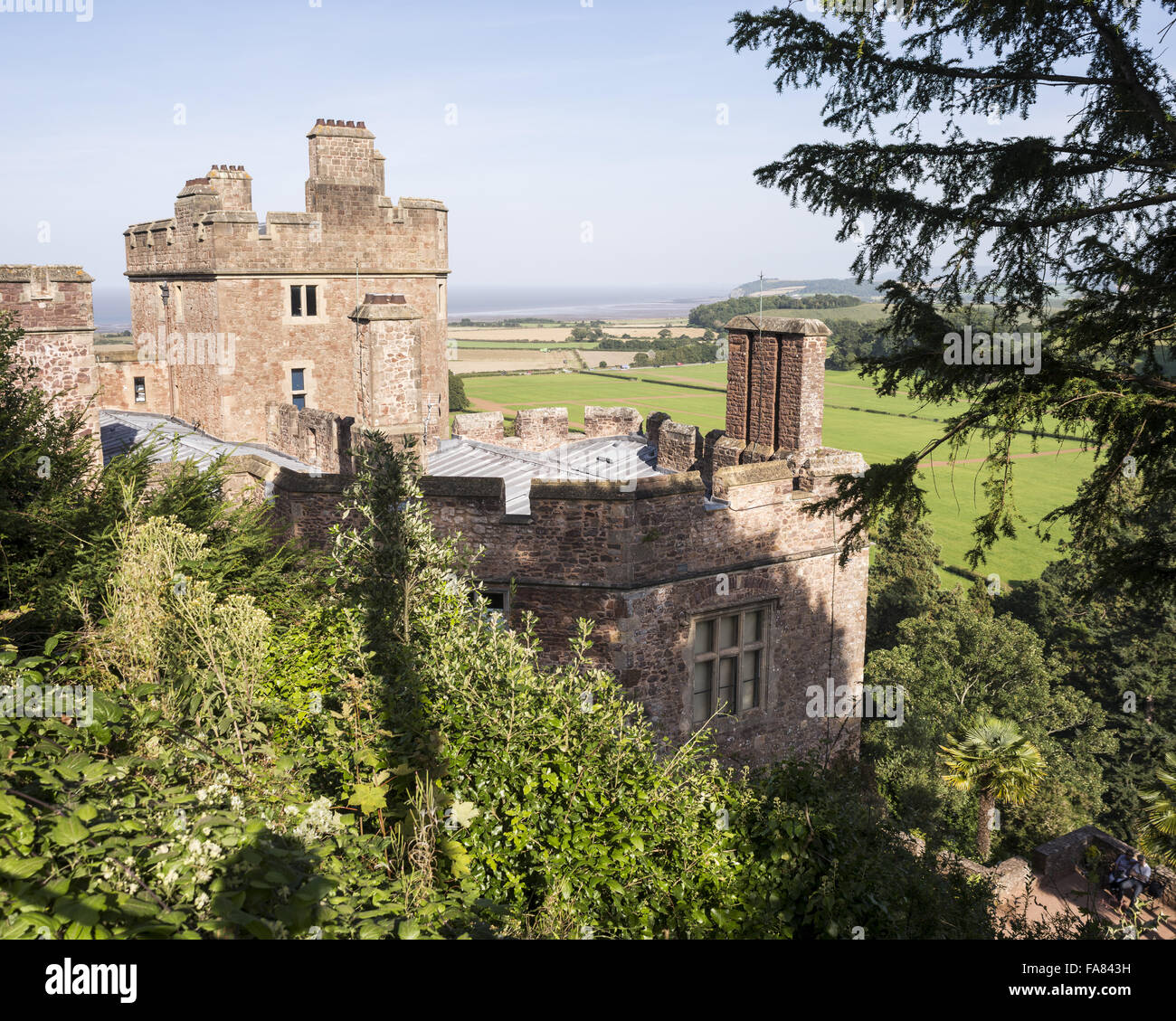 Dunster Castle, Somerset, and the view north towards the coast. The ...