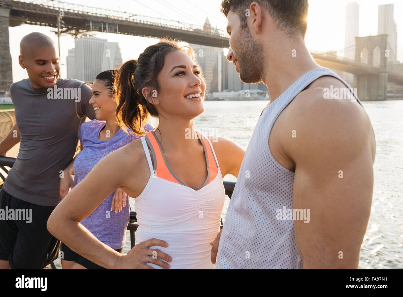 Male female runners talking hi-res stock photography and images - Alamy