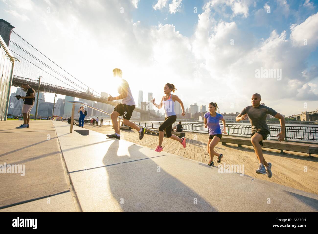Four friends on the stairs outdoors hi-res stock photography and images ...