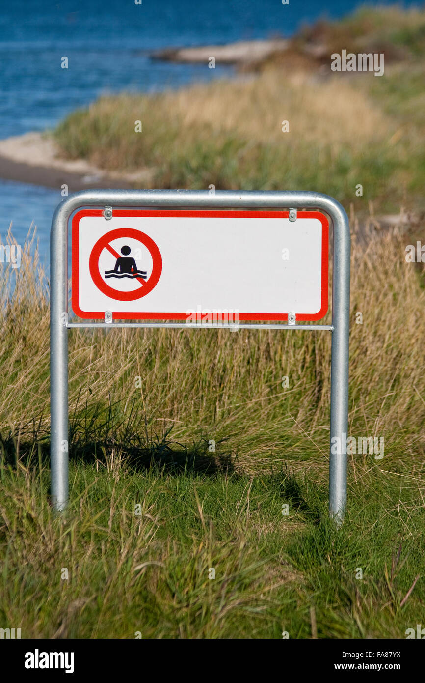 Closeup on swimming prohibited sign. Copy space Stock Photo - Alamy