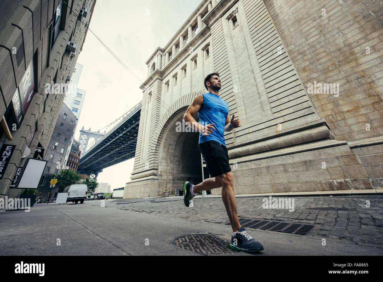 Young male runner running in Brooklyn, New York, USA Stock Photo - Alamy