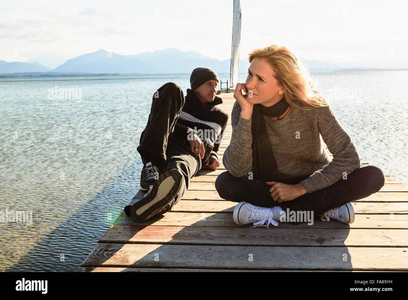 Man sitting legs apart hi-res stock photography and images - Alamy