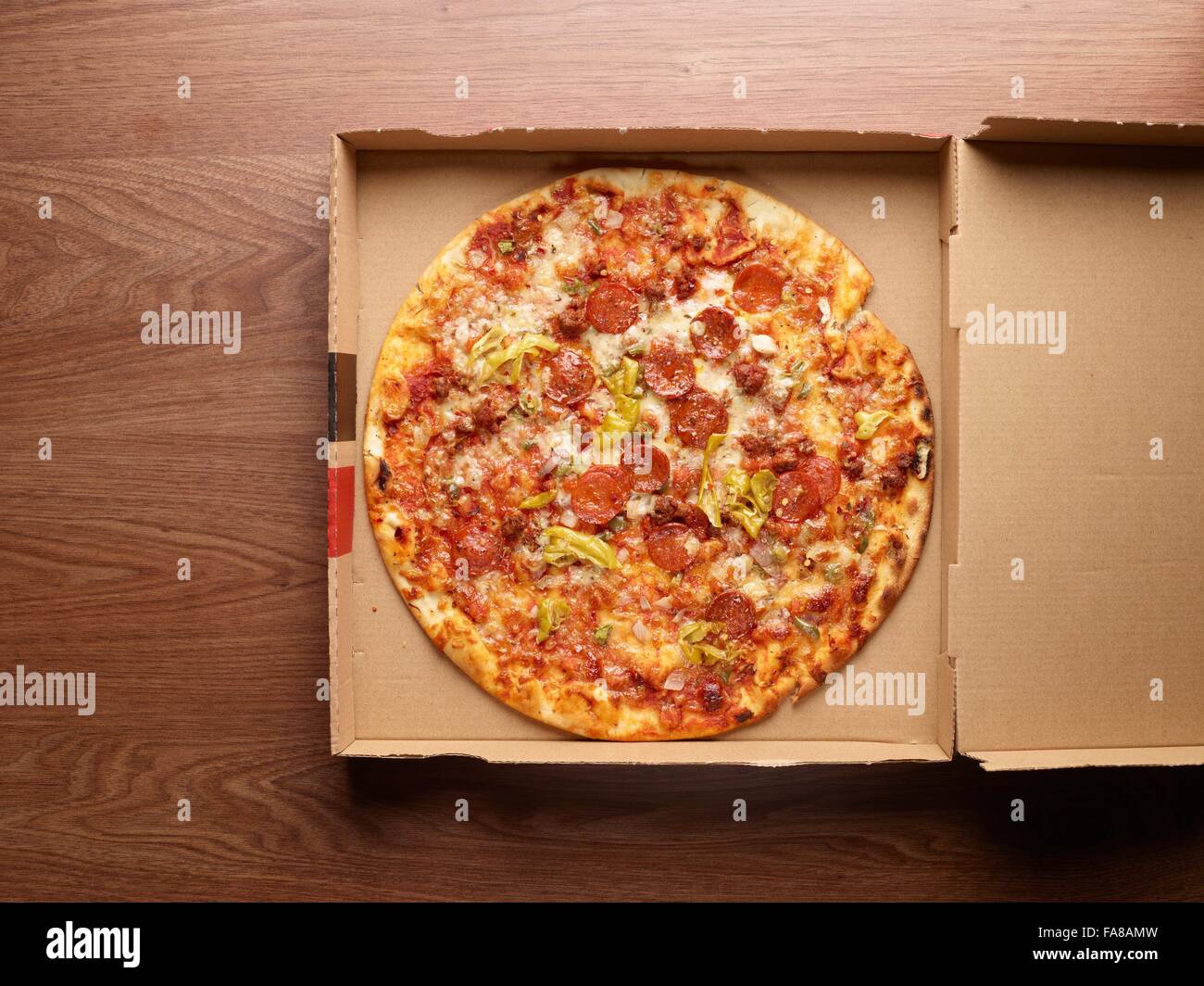 Pizza in box, overhead view Stock Photo - Alamy