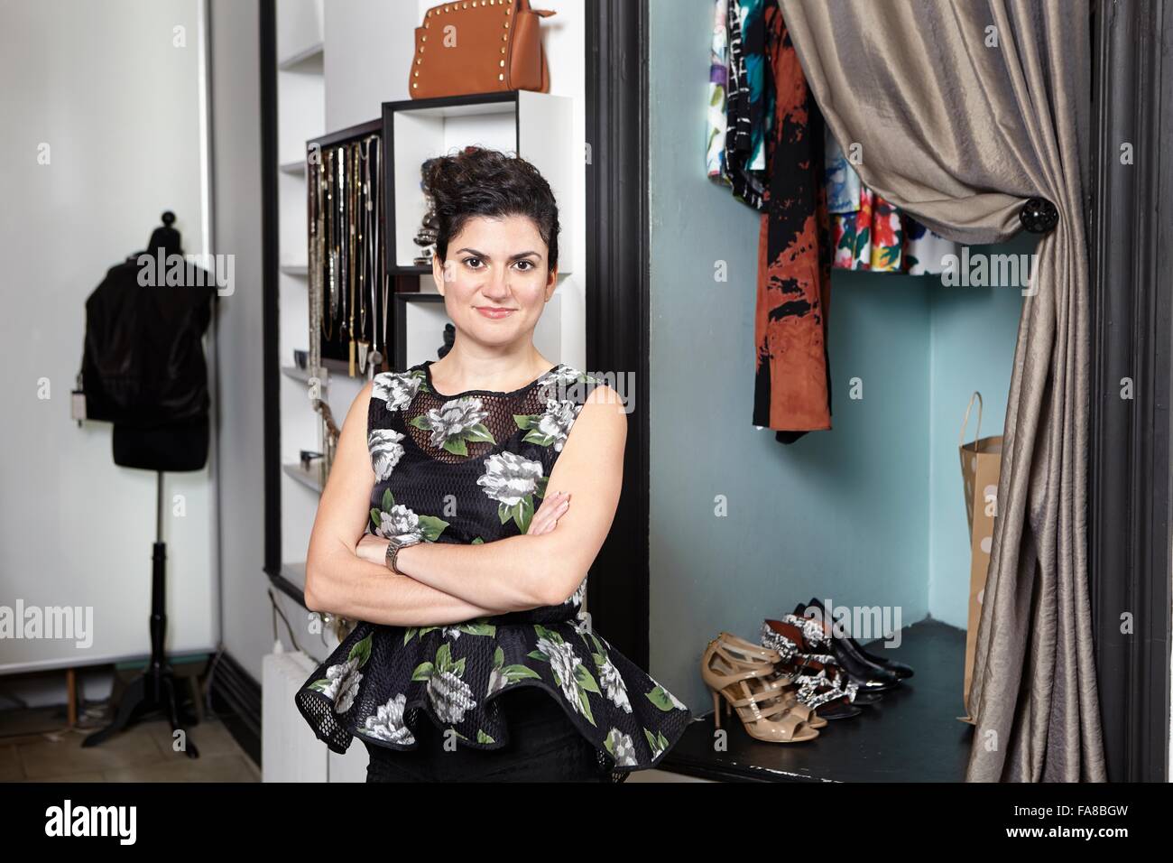 Portrait of business owner in fashion boutique Stock Photo - Alamy