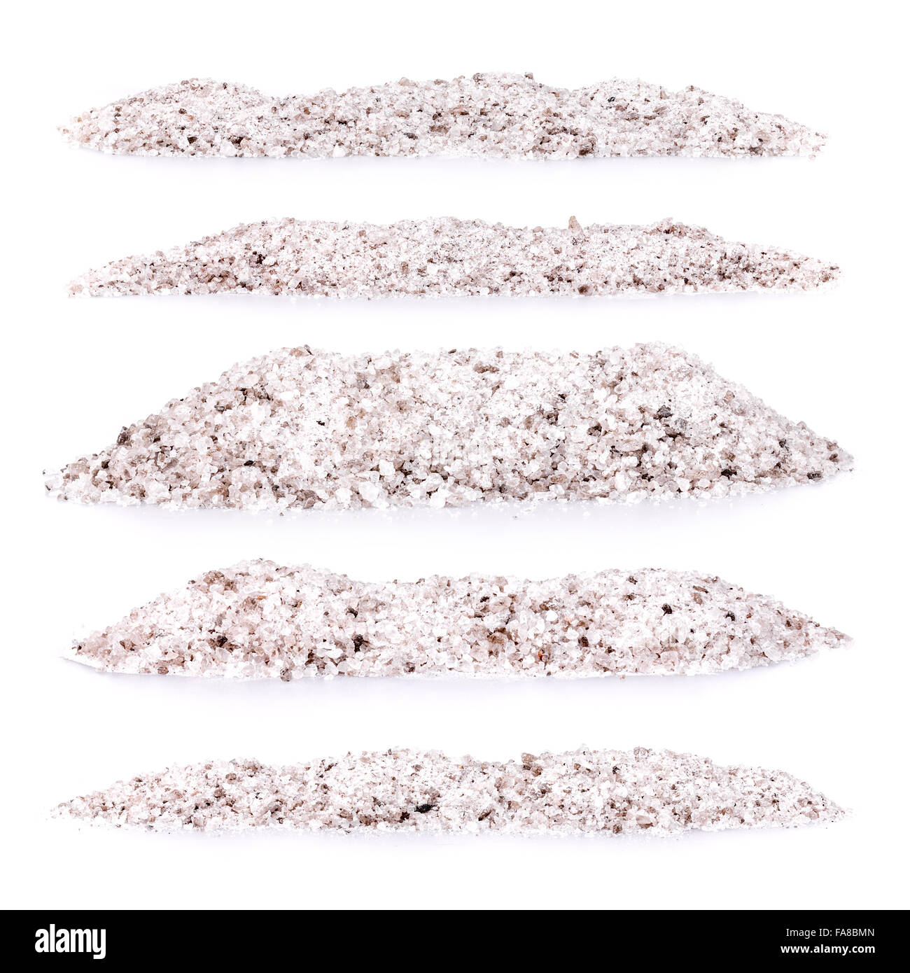 Set pile of bath salt on white background Stock Photo - Alamy