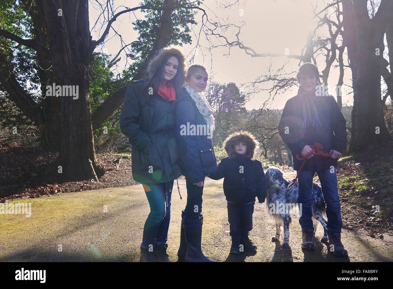 Portrait of four siblings, outdoors Stock Photo - Alamy