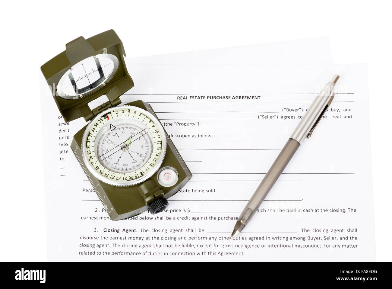 Documents with compass Stock Photo - Alamy