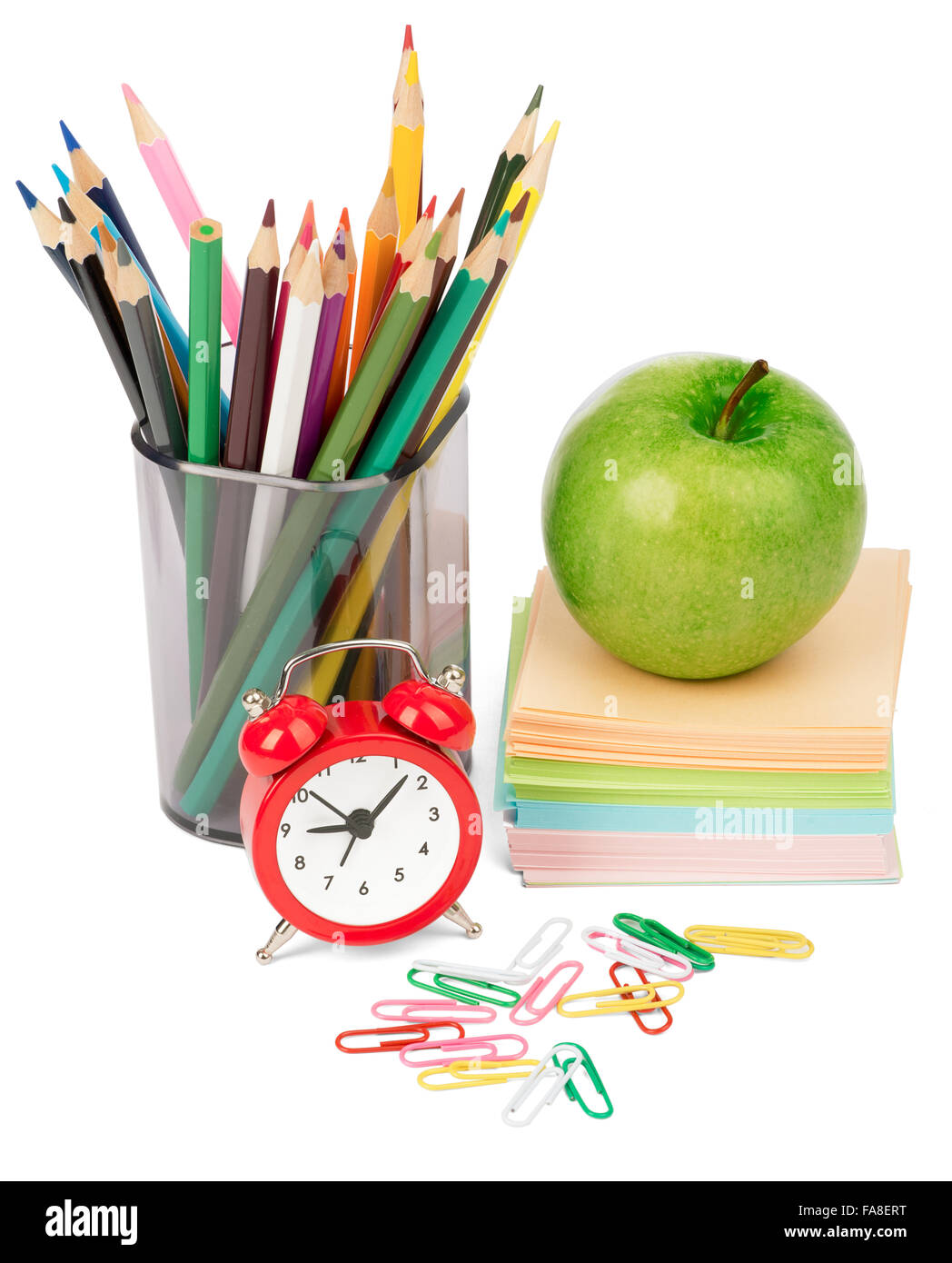 Alarm clock, green apple, stickers and crayons Stock Photo - Alamy