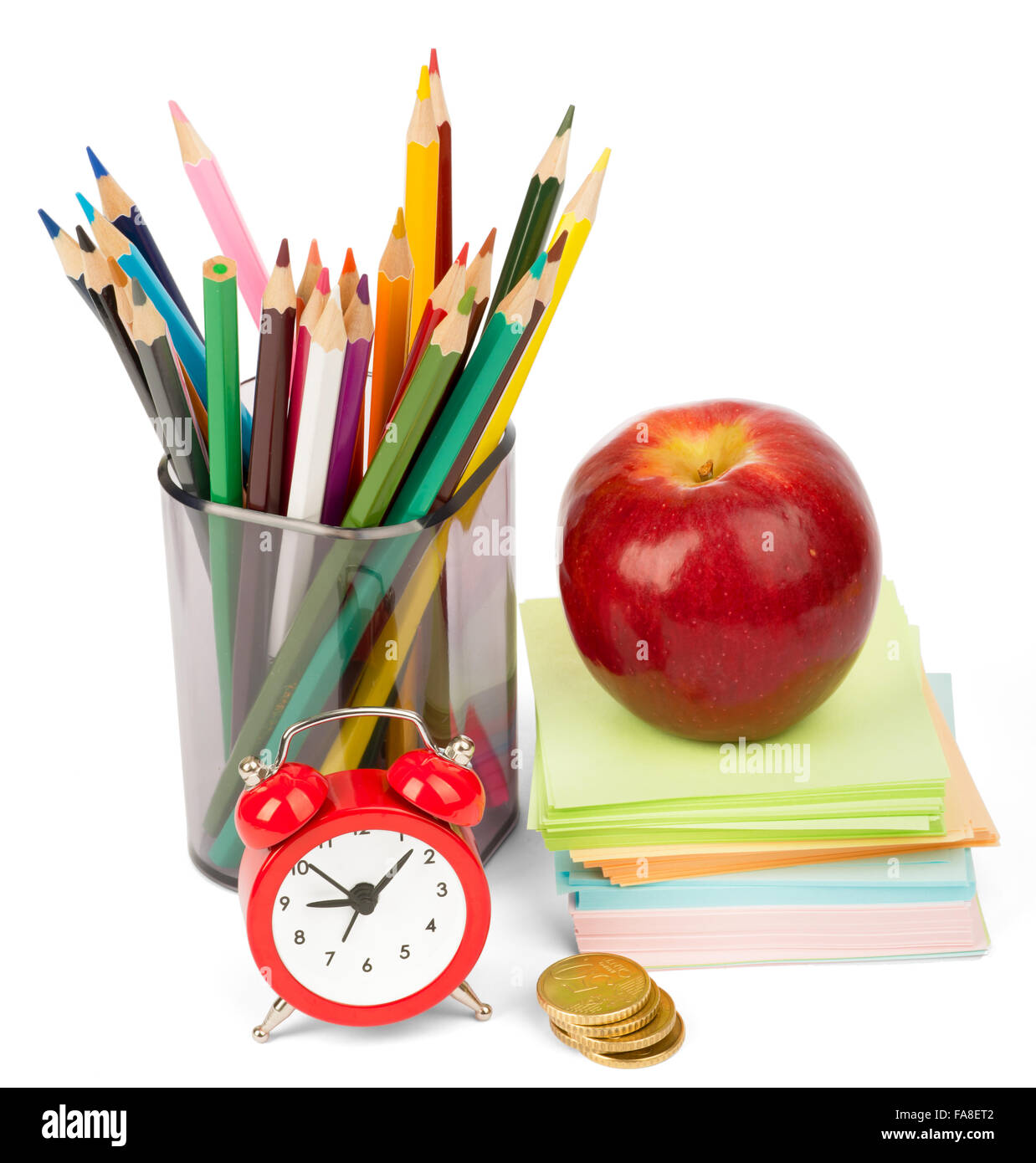 Alarm clock with red apple Stock Photo - Alamy