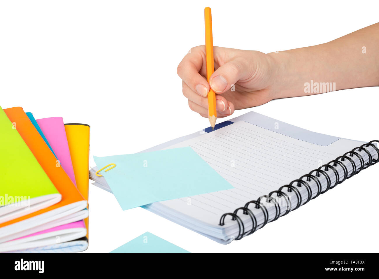 Females hand writing in notebook Stock Photo - Alamy