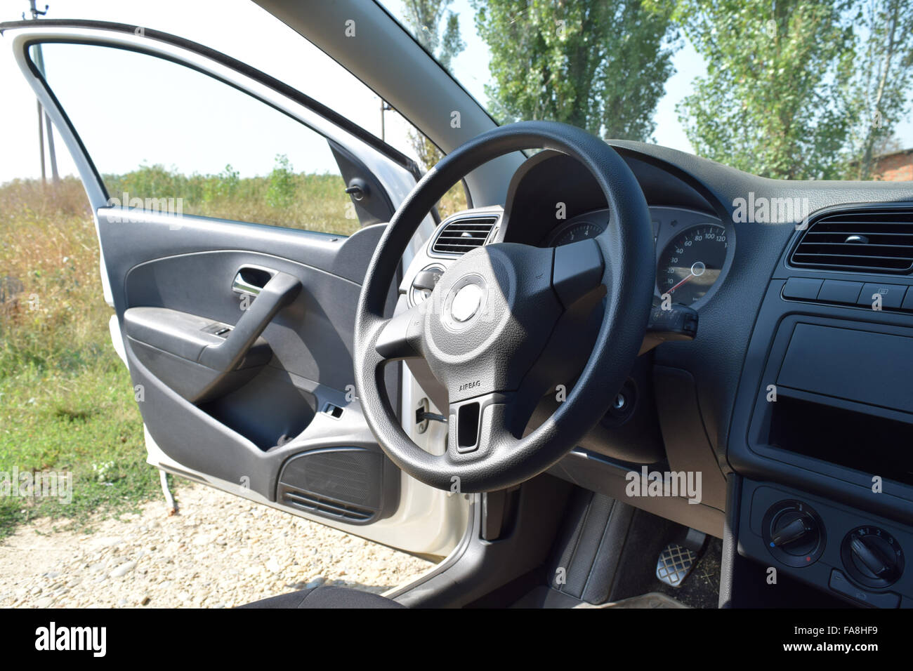 Salon of the car with an open door. Car interior Stock Photo - Alamy