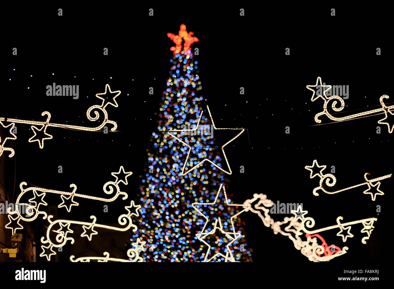 An illuminated Christmas tree displayed at the Christian quarter Old ...