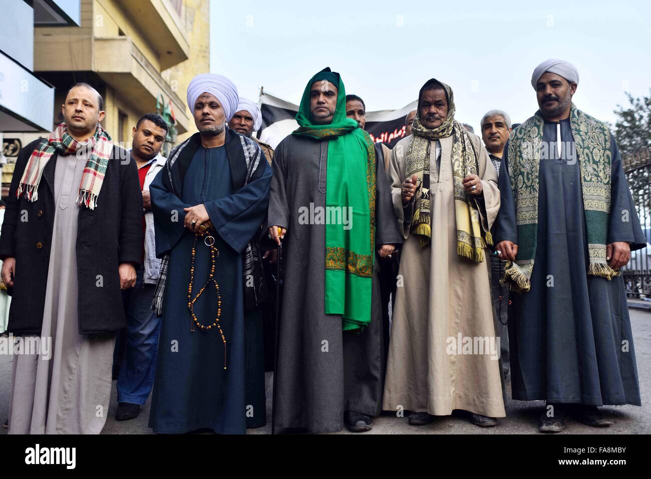 Cairo, Egypt. 23rd Dec, 2015. Egyptian Sufi Muslims chant prayers while ...