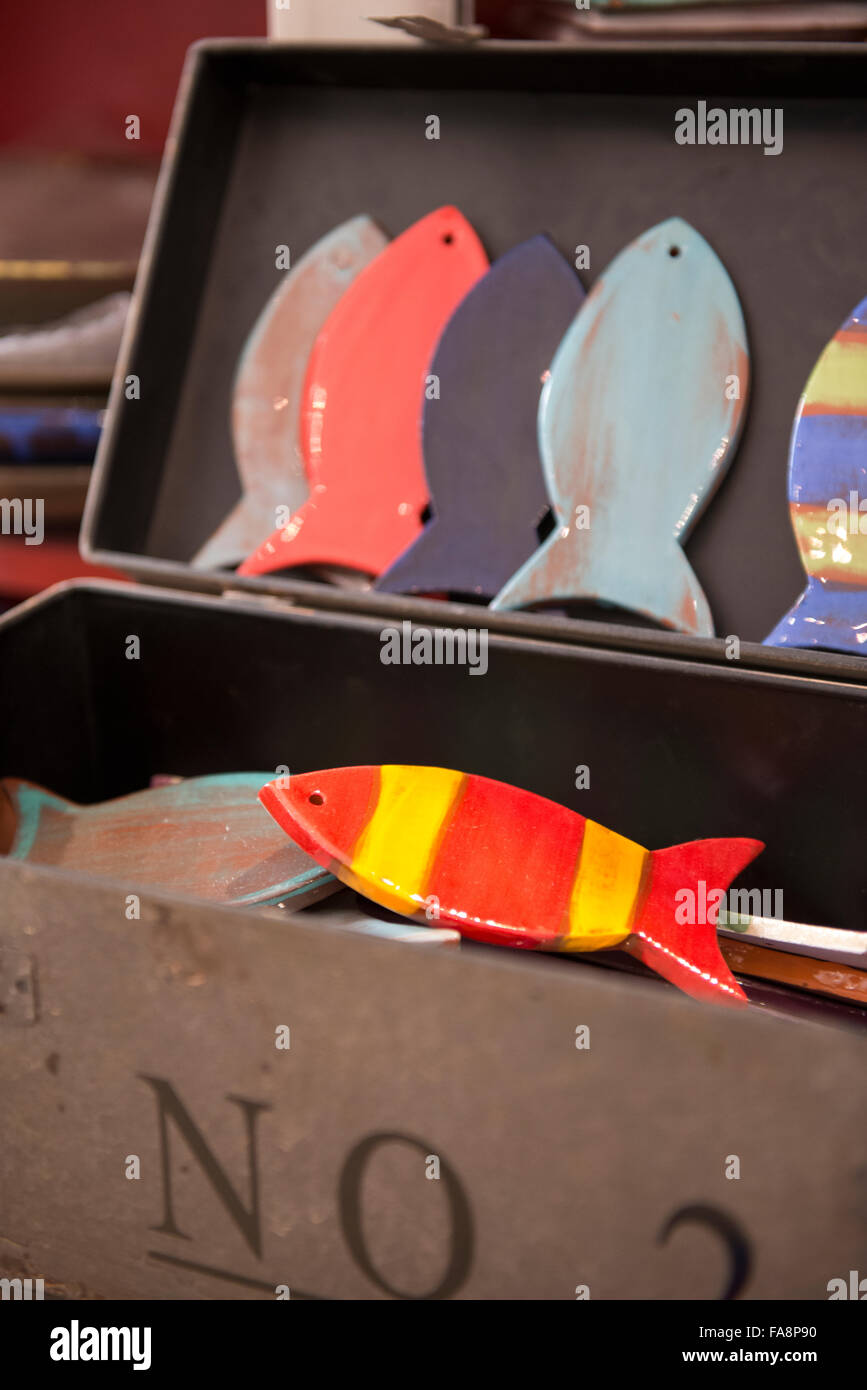 Brightly colored ceramic fish at Colette Ripley's workshop and boutique ...