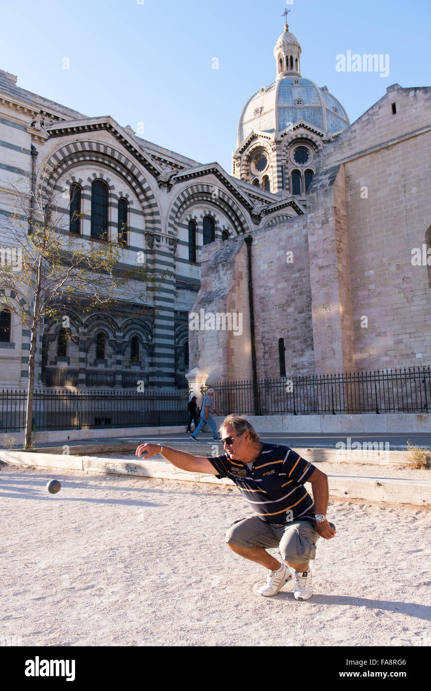 French men playing a game of petanque near the Marseille Cathedral in ...