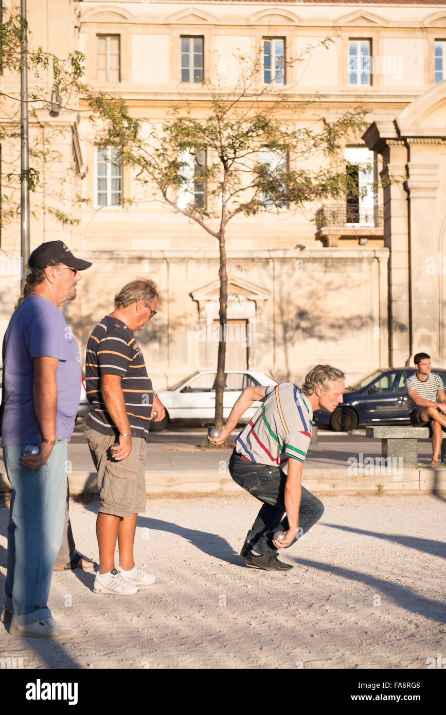 French men playing a game of petanque near the Marseille Cathedral in ...