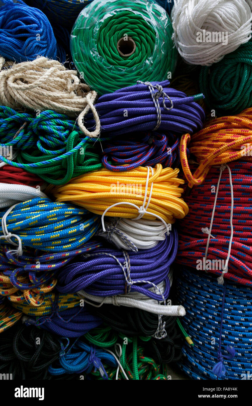 Various colourful ropes on sale Stock Photo - Alamy