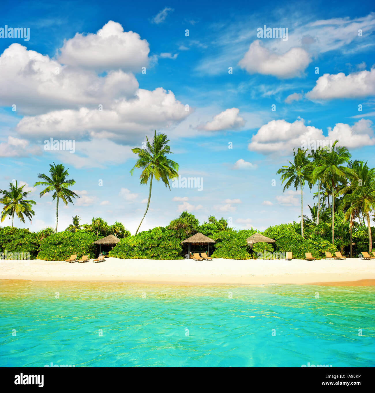 Sand beach. Blue sky. Paradise island with palm trees Stock Photo - Alamy