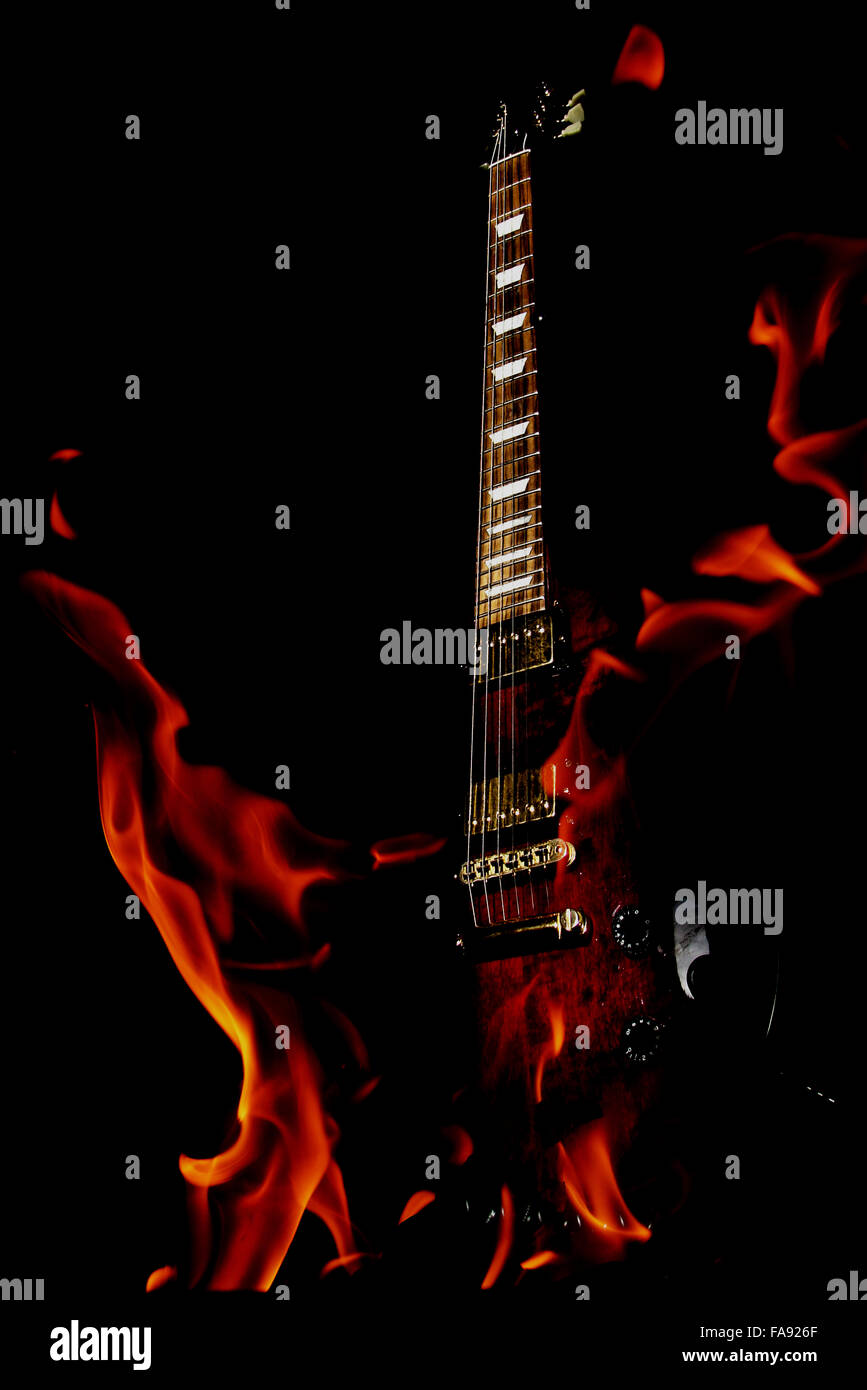double exposure electric guitar and fire Stock Photo - Alamy