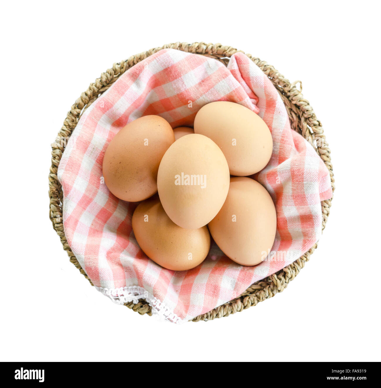 Basket eggs on wooden Cut Out Stock Images & Pictures - Alamy