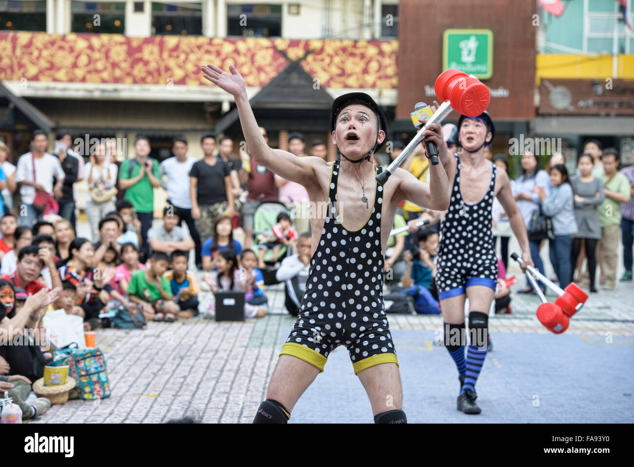 Comic jugglers at a street festival in Bangkok, Thailand Stock Photo ...