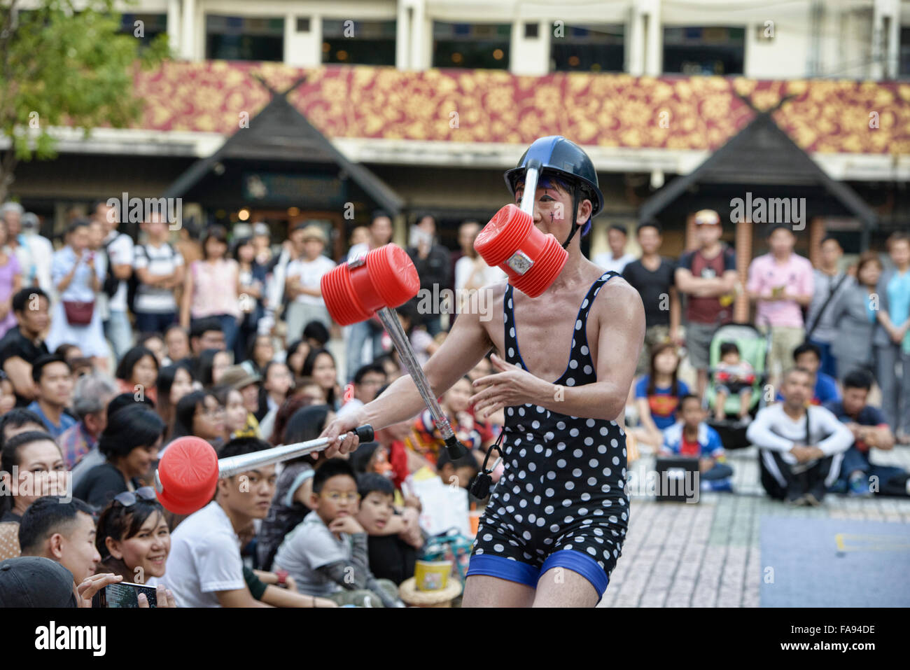 Comic juggler at a street festival in Bangkok, Thailand Stock Photo - Alamy