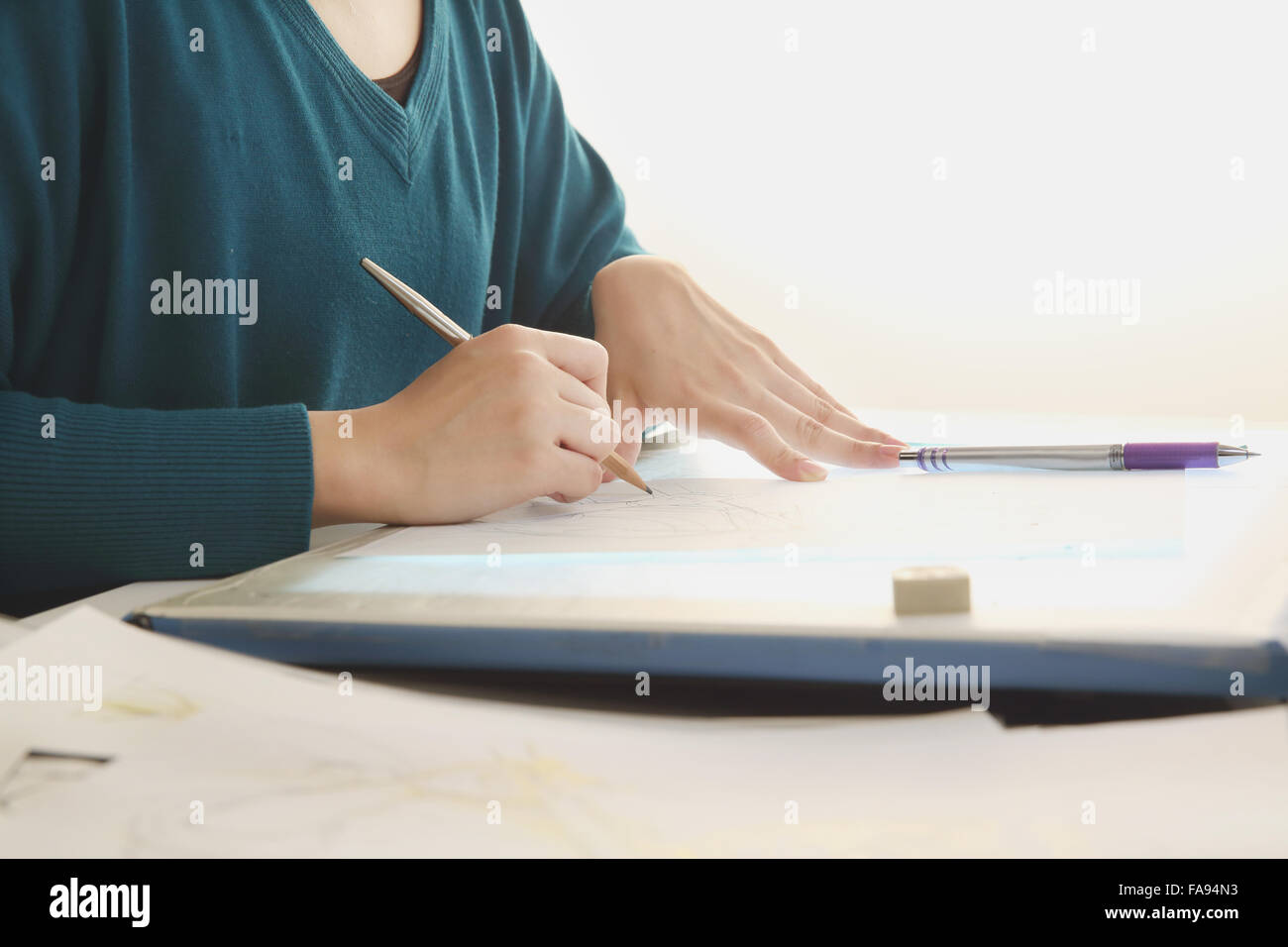 Japanese Manga artist working in the studio Stock Photo - Alamy
