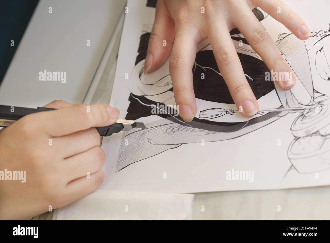 Japanese Manga artist working in the studio Stock Photo - Alamy