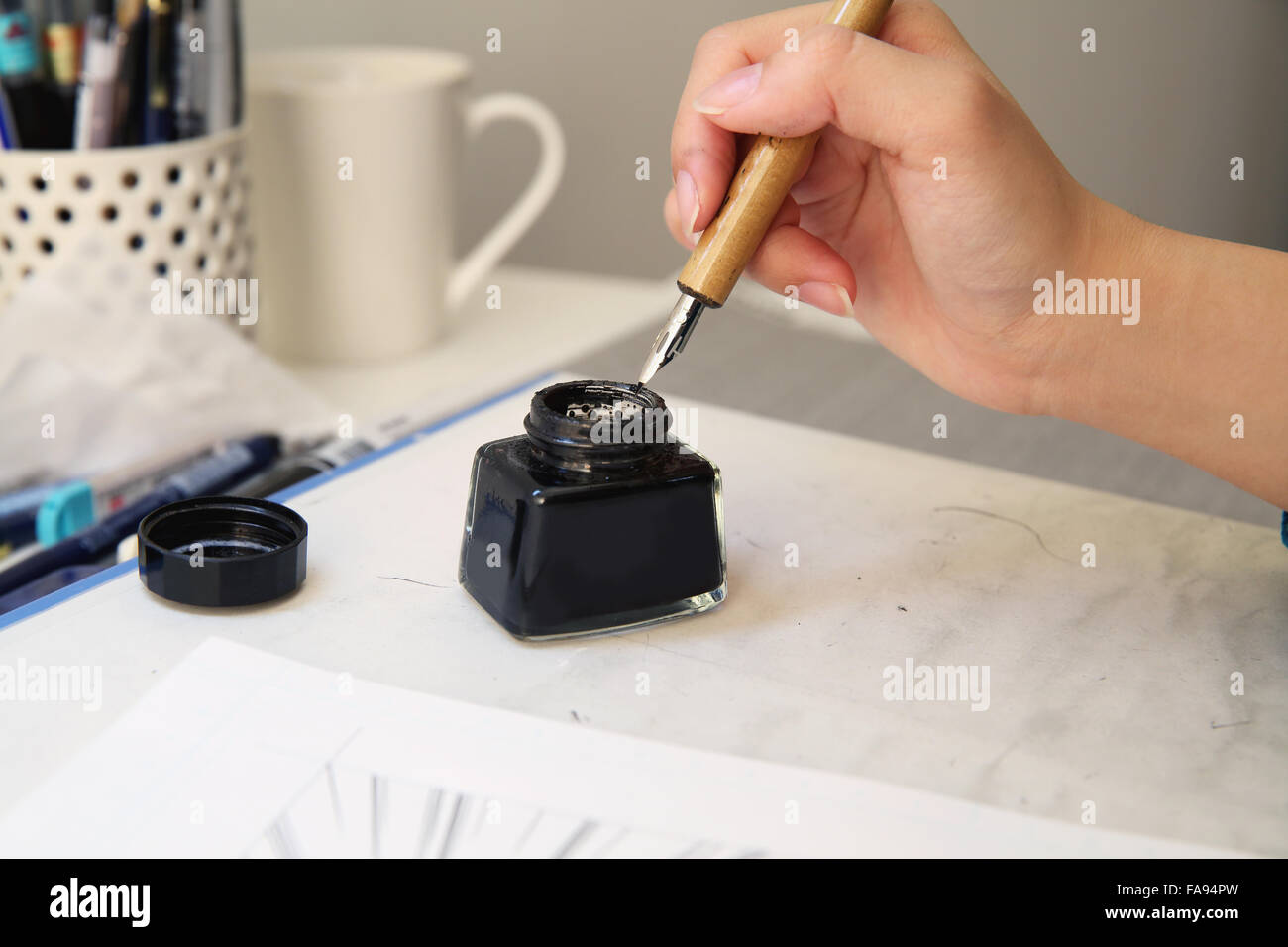 Japanese Manga artist working in the studio Stock Photo - Alamy